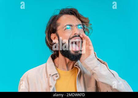 Man shouting loud calling attention with hands like megaphone isolated ...