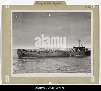 Coast Guard-Manned LST Ready For Rail Loading. At a British port, a ...