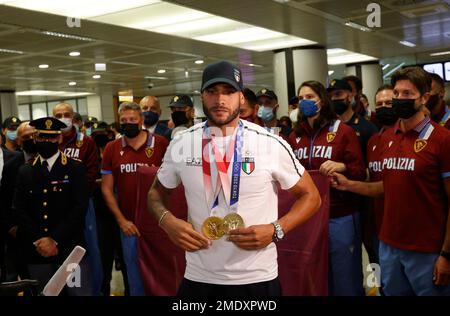 Italian sprinter Marcell Jacobs shows his medals, won in the men's 100 ...