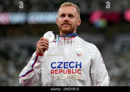 Jakub Vadlejch, of the Czech Republic, poses after winning the silver ...