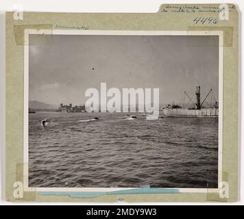 A Coast Guard-manned LST (Landing Ship Tank) serves as a temporary ...
