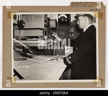 LORAN. Navigator aboard ship obtaining positional data from a LORAN ...