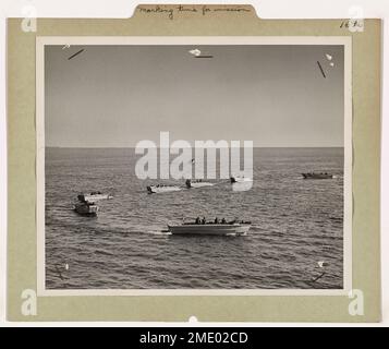 Coast Guard-manned invasion barges are shown conducting training ...