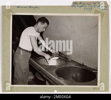 At a supply base in the Pacific, Coast Guard-manned LSTs offload a ...