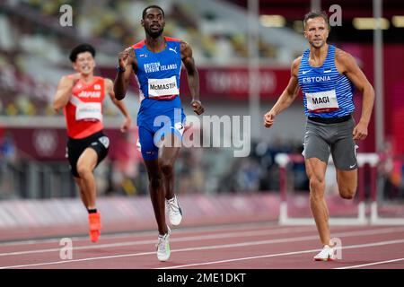 Kyron Mcmaster, center, of British Virgin Islands, wins a men's 400 ...