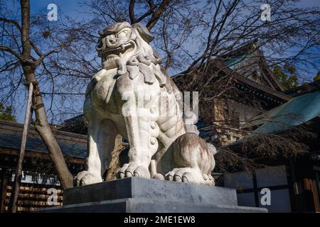Stone carved Komainu Lion-dog guardian at Suzukamyo Shrine, Located in ...