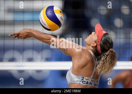 Brandie Wilkerson, of Canada, returns a shot during a women's beach ...