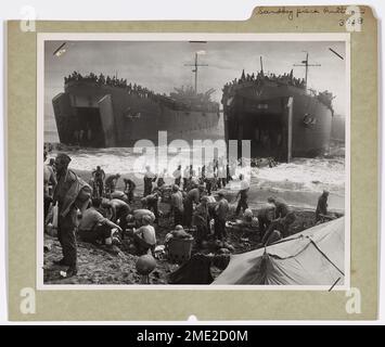 Two Coast Guard-manned LST's open their great jaws in the surf that ...