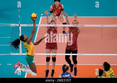 Brazil's Fernanda Garay Rodrigues hits a ball past South Korea's Yang ...