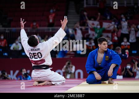 Lasha Bekauri of Georgia, right, and Eduard Trippel of Germany compete ...