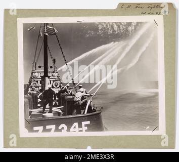 A Coast Guard vessel is equipped with a firefighting monitor to enhance ...