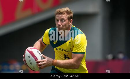 Australia's Lachie Miller runs with the ball during a men's rugby ...