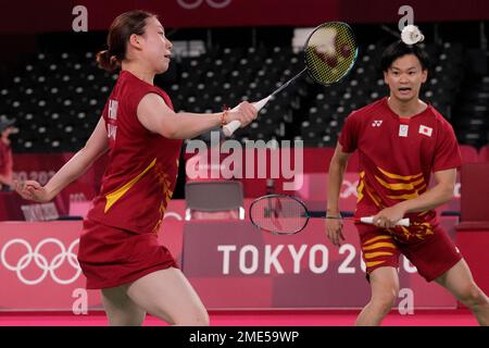 Denmark's Mathias Christiansen, right, and Alexandra Boje compete ...
