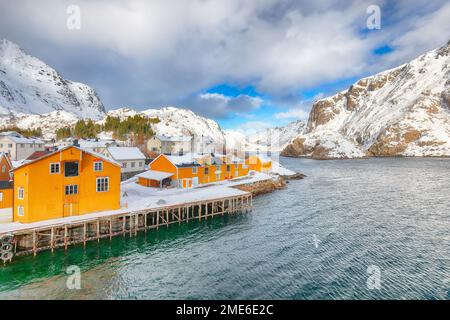 Stunning morning seascape of Norwegian sea and cityscape of Nusfjord ...