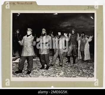 Germans Captured on Greenland: Coast guardsmen guard a group of German ...