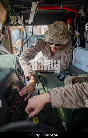 A U.S. Marine Corps AMKR18 logistics vehicle system drives across the ...