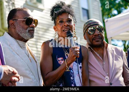 Elaine Isley Goodstone, left, Ernie Isley and Ron Isley, right, speak ...
