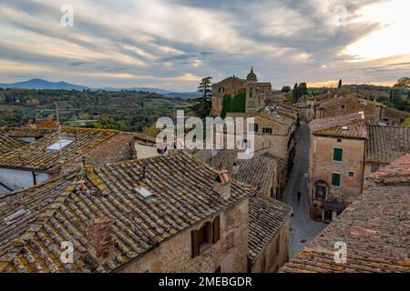 View of the tops of stone buildings with terracotta roof tiles, in the ...