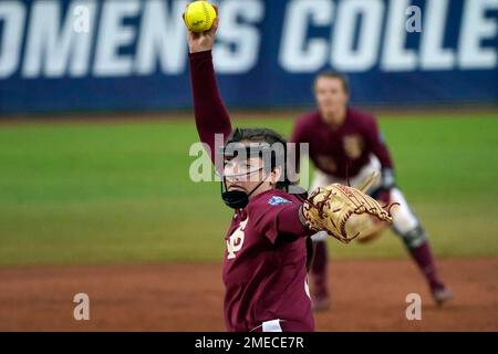 Florida State pitcher Kathryn Sandercock, second from right, hugs ...