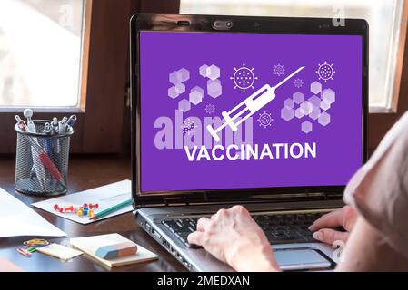 Laptop screen displaying a vaccination concept Stock Photo - Alamy