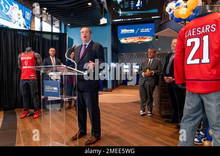 Caesars Sports & Online Gaming Co-President Eric Hession, right ...