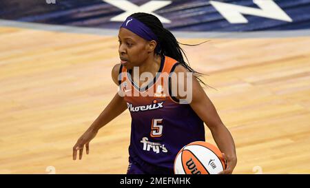 Phoenix Mercury guard Shey Peddy, left, and Las Vegas Aces guard Jackie ...