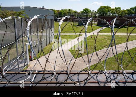 Razor wire surrounds the perimeter fencing at the former Arthur Kill ...