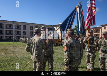 Command Sgt. Maj. Daniel Roney, right, receives congratulations after a ...