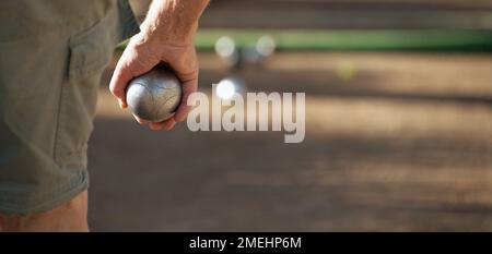 Senior playing petanque fun and relaxing game, man plays petanque with ...