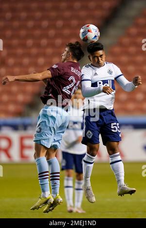 Vancouver Whitecaps midfielder Michael Baldisimo, left, and Calgary ...