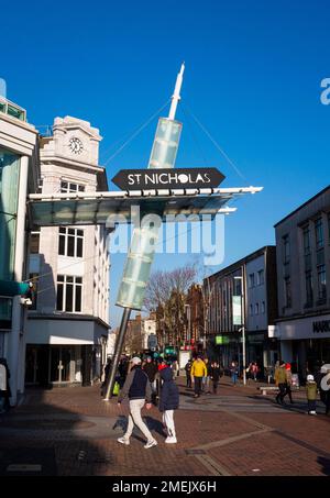 Shoppers walk by the entrance of the St Nicholas shopping Mall in ...