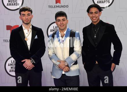 Musical group Eslabon Armado, from left, Bryan Tovar, Pedro Tovar, and ...