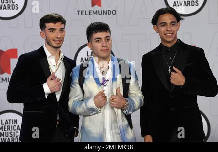 Musical group Eslabon Armado, from left, Bryan Tovar, Pedro Tovar, and ...