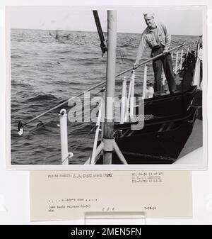 Coast Guard Searches Wreckage of Ill-fated Airliner. This image depicts ...