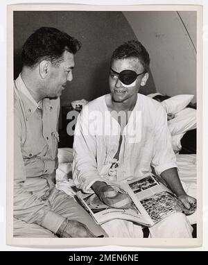 Coast Guard Commander Jack Dempsey, a former boxing champion, arrived ...