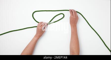 Single Figure-of-Eight Loop on the Bight, knot tied in green rope, in ...