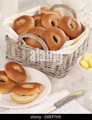 High angle view of bagels in crumpled paper on wooden table Stock Photo ...