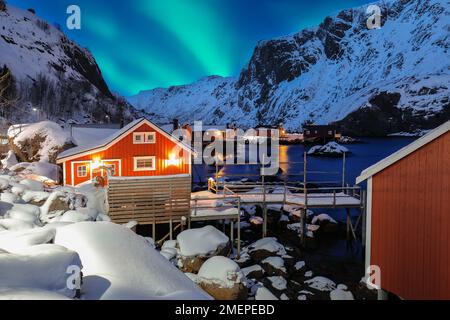 Fabulous evening seascape of Norwegian sea and cityscape of Nusfjord ...
