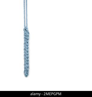 Knitted button loop Stock Photo - Alamy