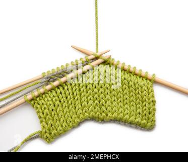 Example of picked up hem knitting technique Stock Photo - Alamy
