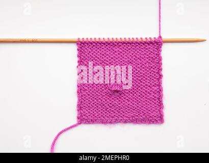 Example of tulip cluster bobble knitting technique Stock Photo - Alamy