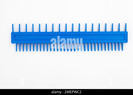 Blue plastic marbling comb Stock Photo - Alamy