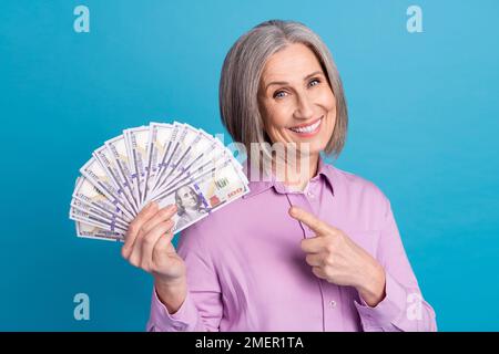Photo of charming positive lady millionaire short haircut arm ...