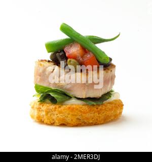 Canape, seared tuna nicoise croute Stock Photo - Alamy