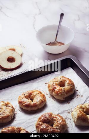 Apple rings in puff pastry, with cinnamon and powdered sugar Stock ...
