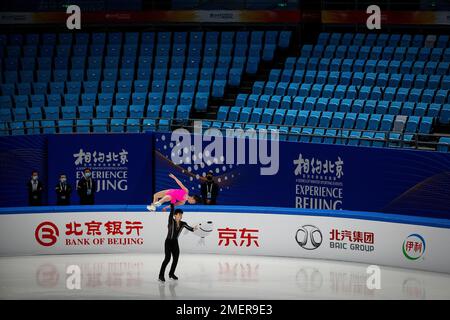 Chinese skaters Yang Yixi and Deng Shun Yuyao perform their pairs short ...