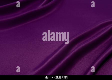 Magenta silk. Wavy soft folds. Trendy color. Abstract background, copy ...