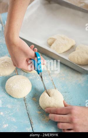 bread making series. Bread dough balls form the shape of sheep and rise ...
