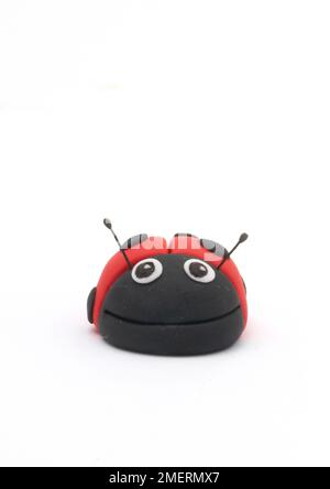 Ladybird made of fondant icing Stock Photo - Alamy