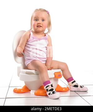 Baby potty on white background Stock Photo - Alamy